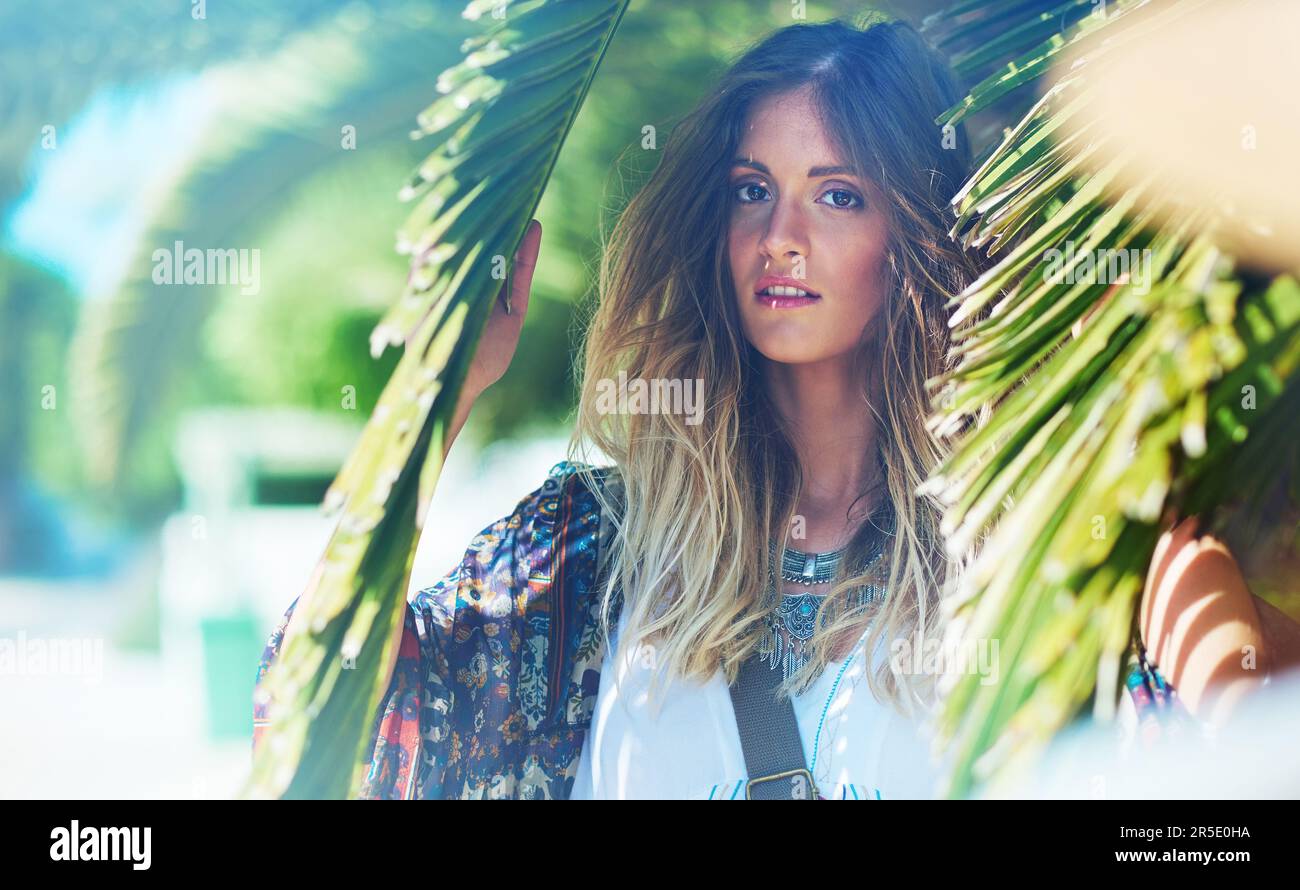 Beauty and nature combined. Portrait of a beautiful young woman ...