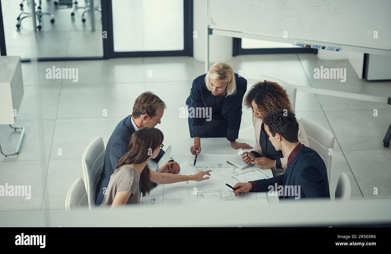 Stitching plans together for success. a team of corporate architects ...