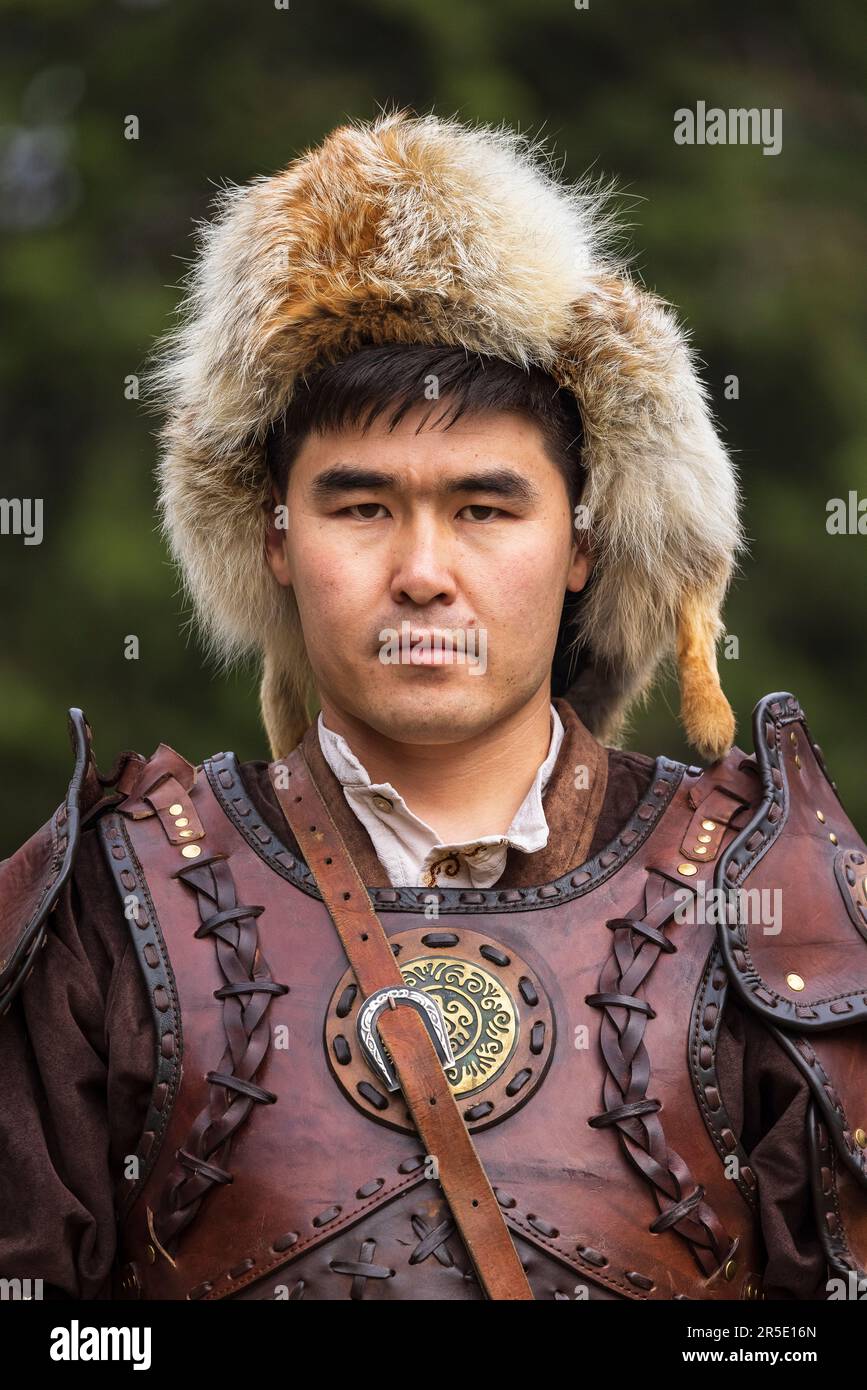 Traditional suit. Man in Ala-Archa National Park. Kyrgyzstan Stock Photo - Alamy
