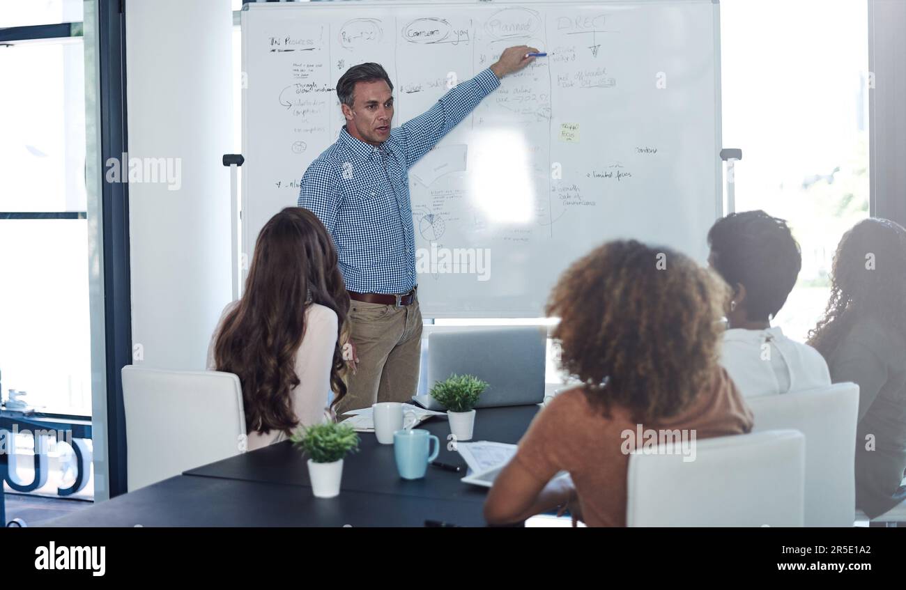 Everyone plays a big role in this company. a businessman delivering a ...