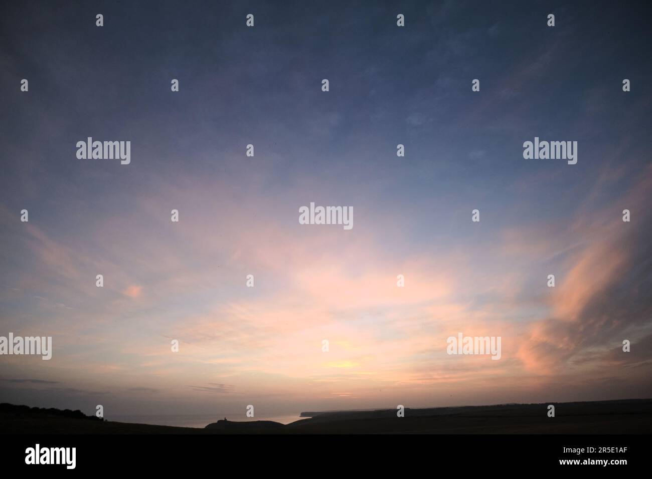 Big sky sunset above Belle Tout Lighthouse at Beachy Head on South ...