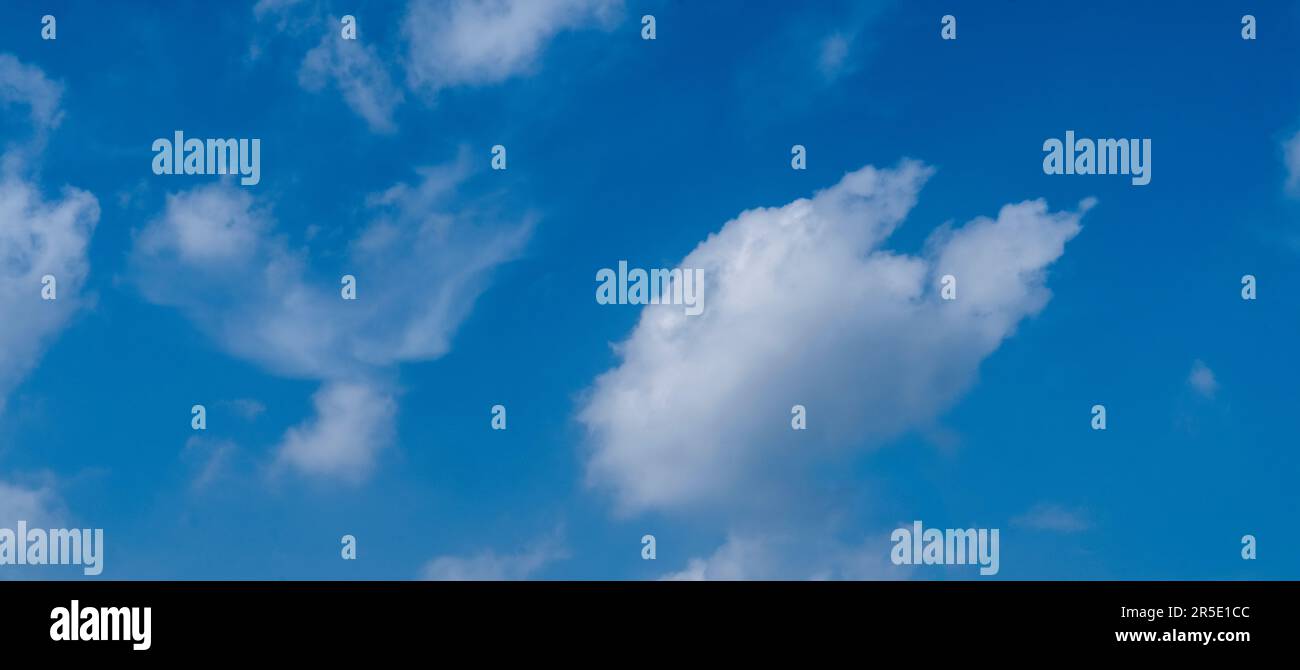 midday blue sky with white cloud nature background Stock Photo - Alamy