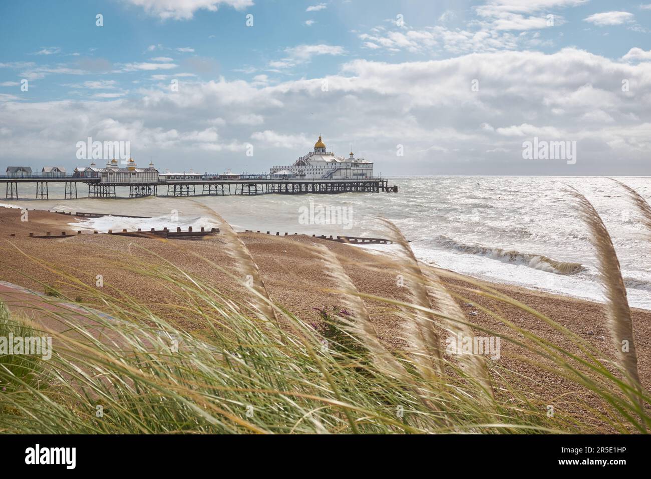 Eastbourne beach and Pier, East Sussex, England. A summertime view ...