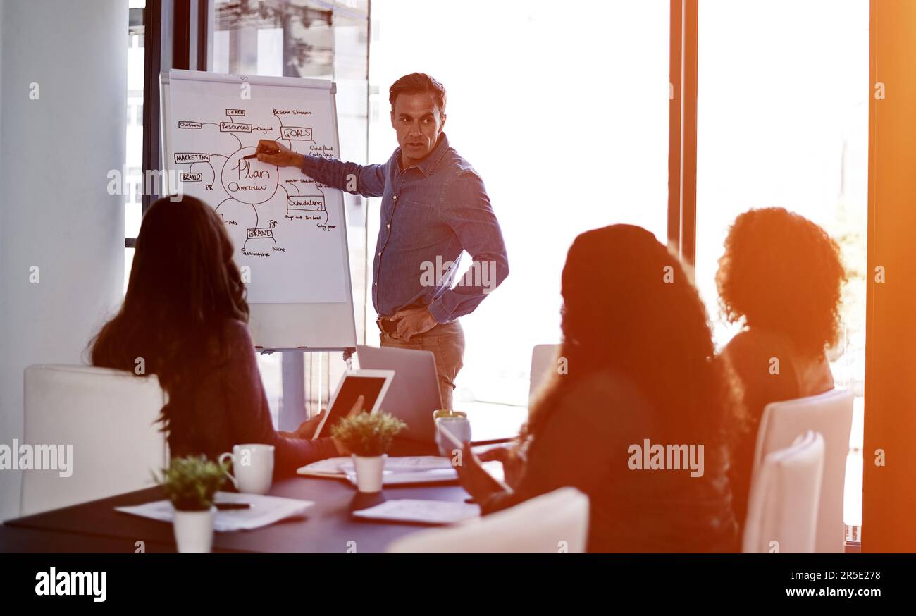 Ideas flow when we get together. a businessman delivering a ...