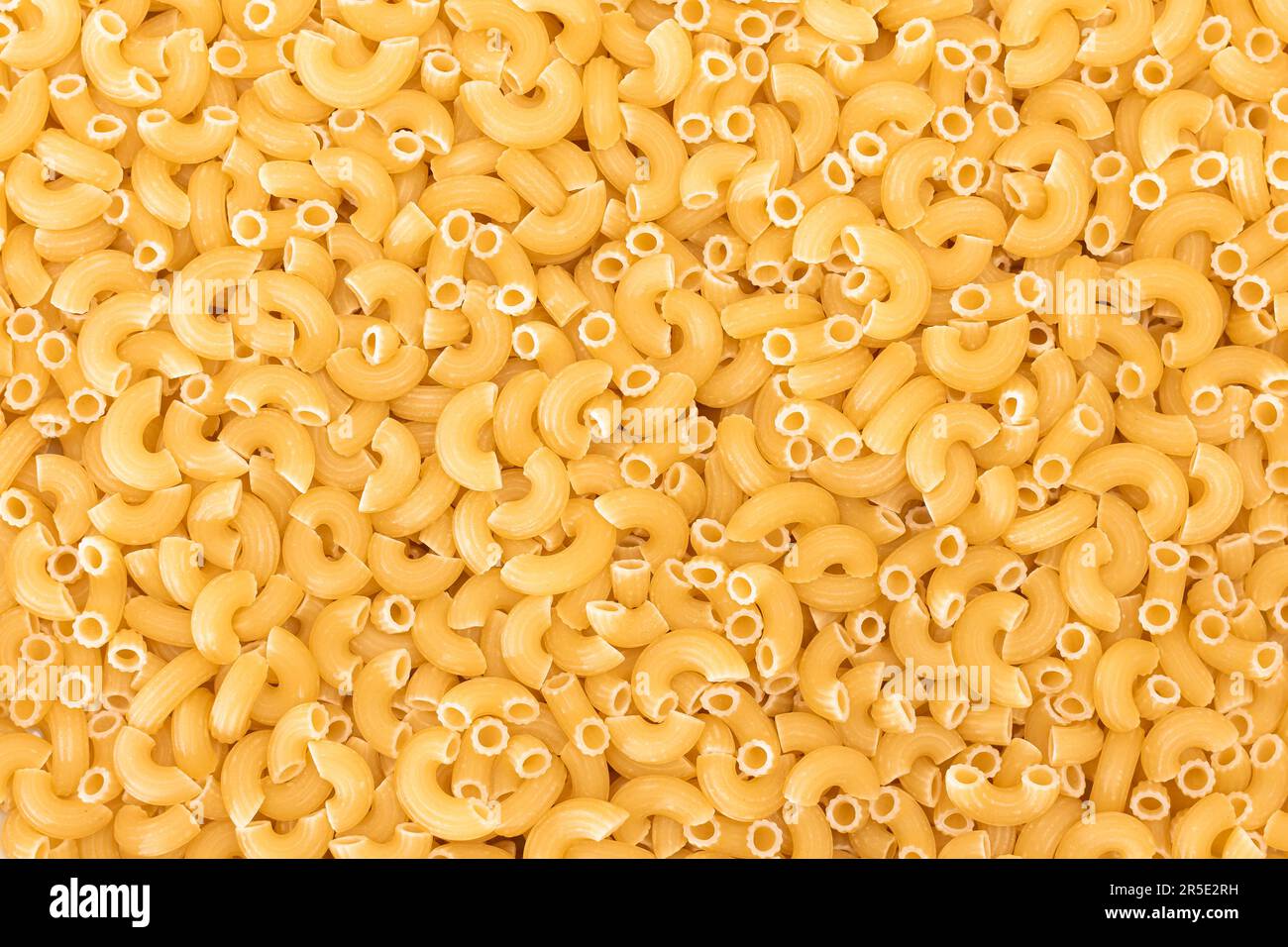 Uncooked Chifferi Rigati Pasta Background. Fat and Unhealthy Food ...