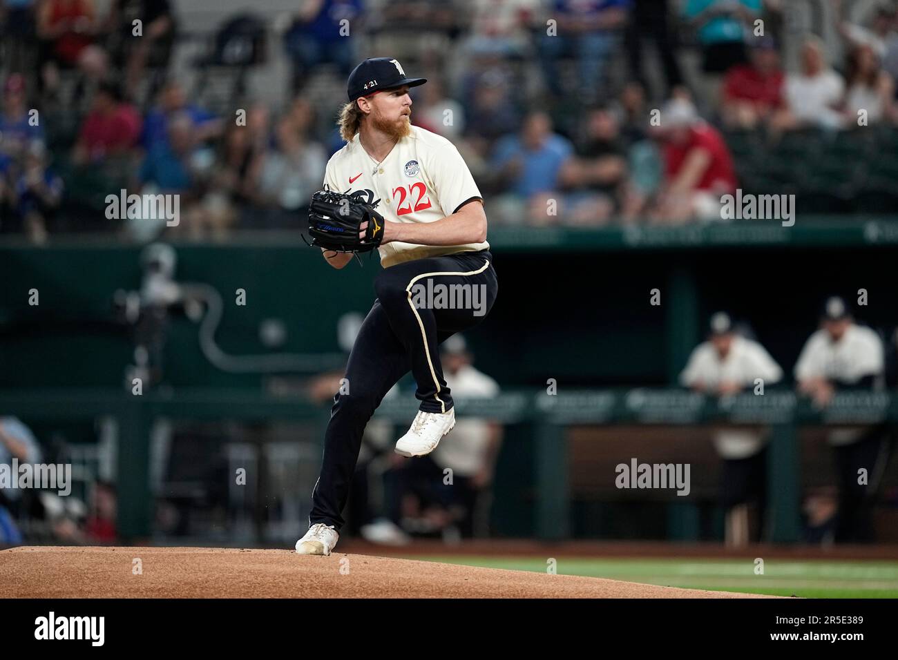 Texas Rangers starting pitcher Jon Gray winds up to throw to the ...