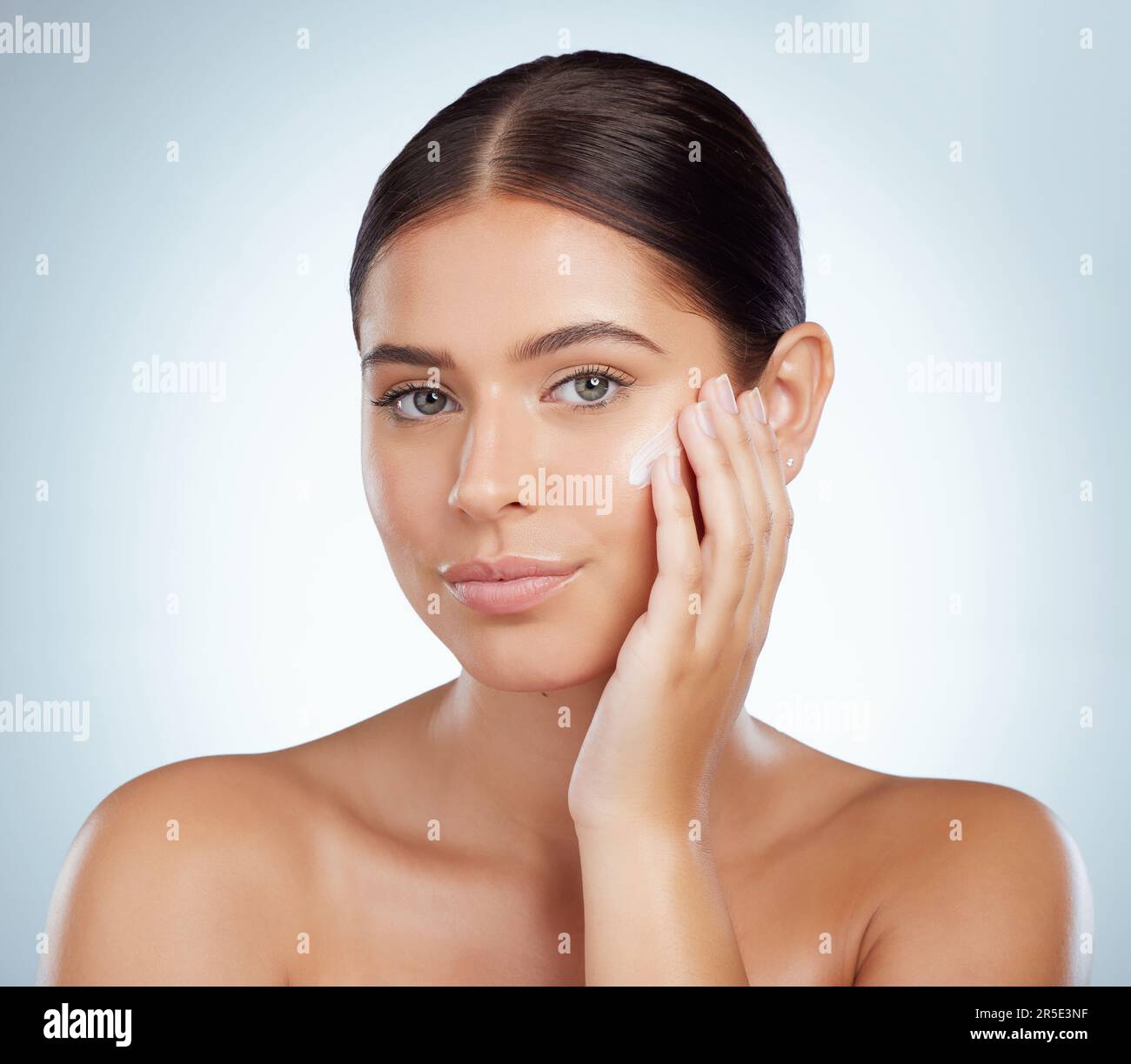 Skincare, face and beauty of woman with lotion in studio isolated on a ...