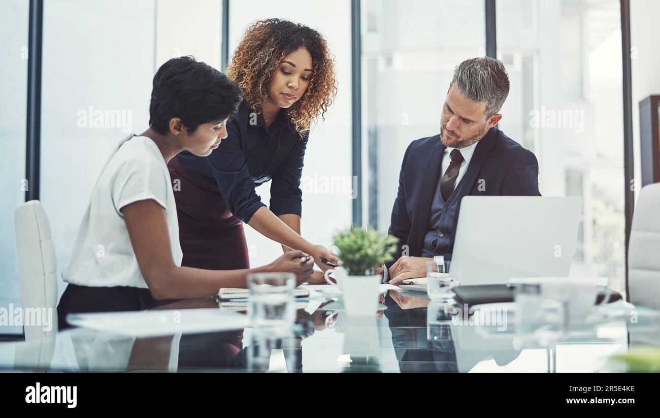 Working hard to achieve the unthinkable. a group of businesspeople ...