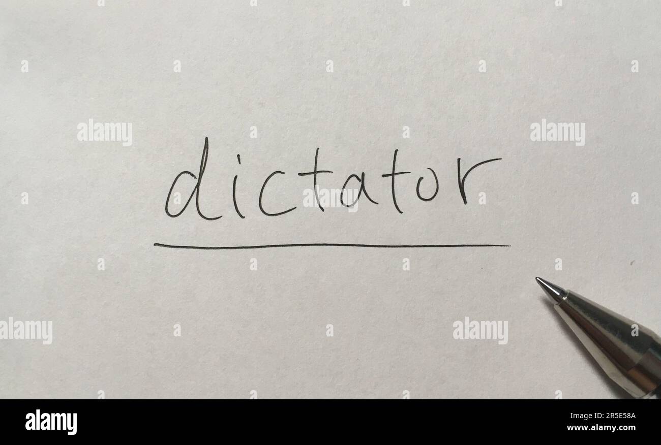 Dictator concept word on paper background Stock Photo - Alamy