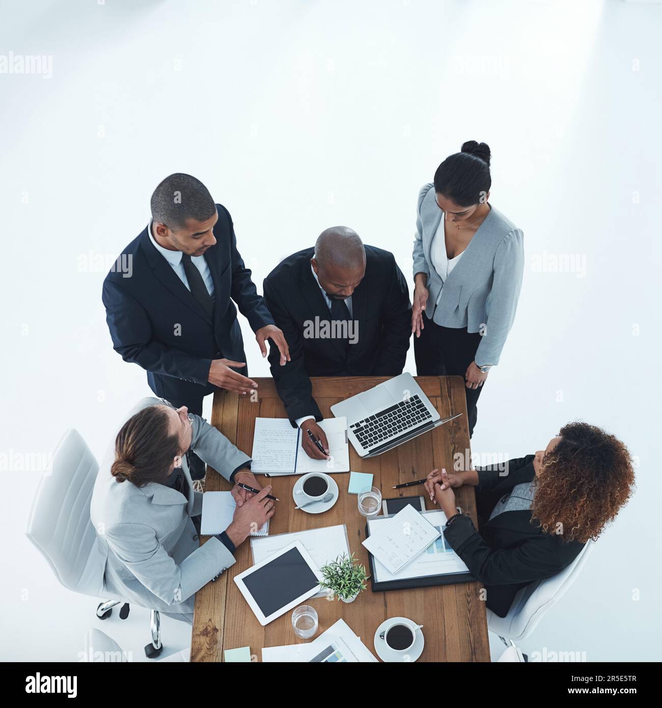 In our team, we share the work evenly. High angle shot of a group of ...