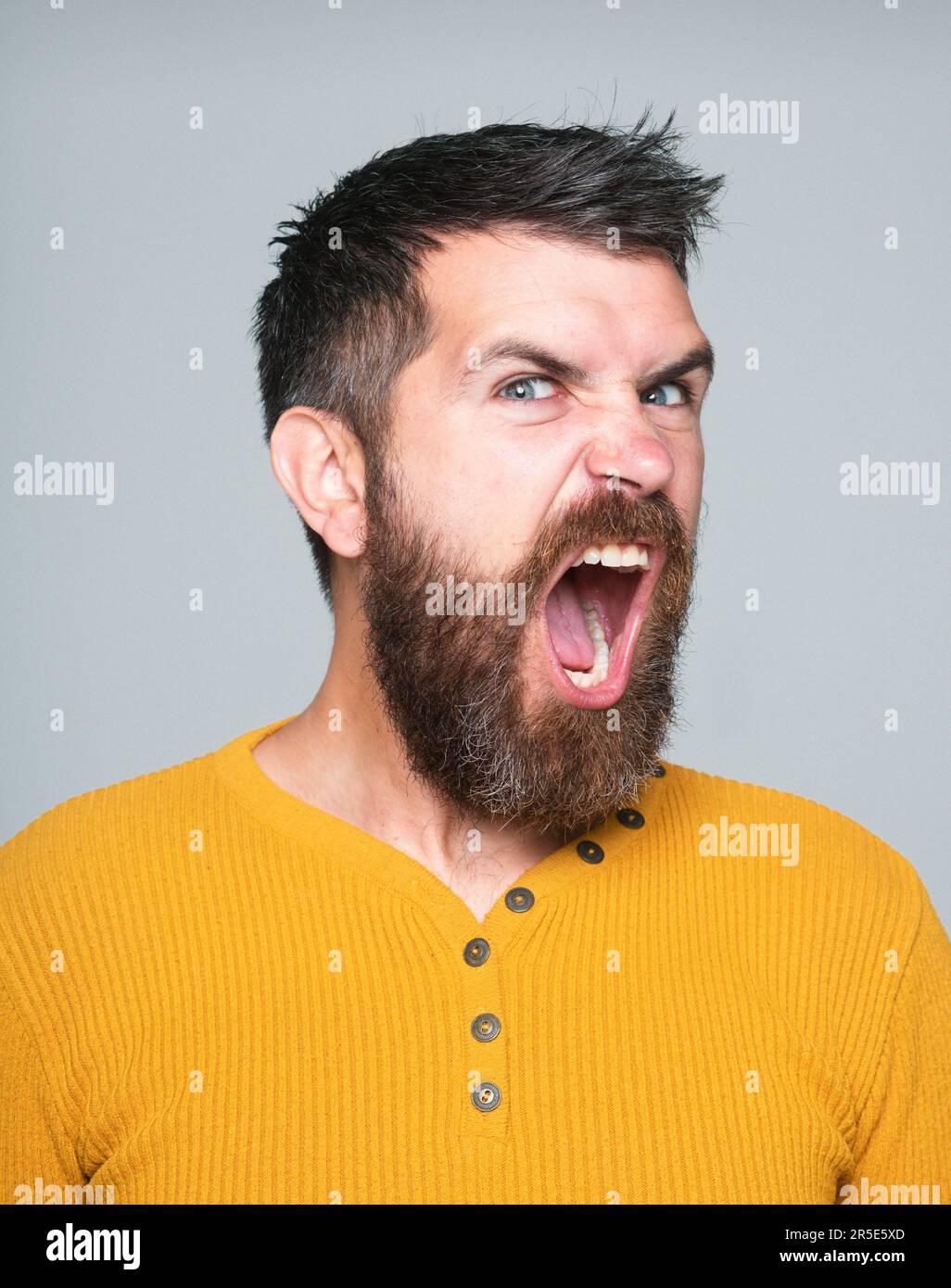 Scream stressful face expression. Angry Barber with long beard and ...