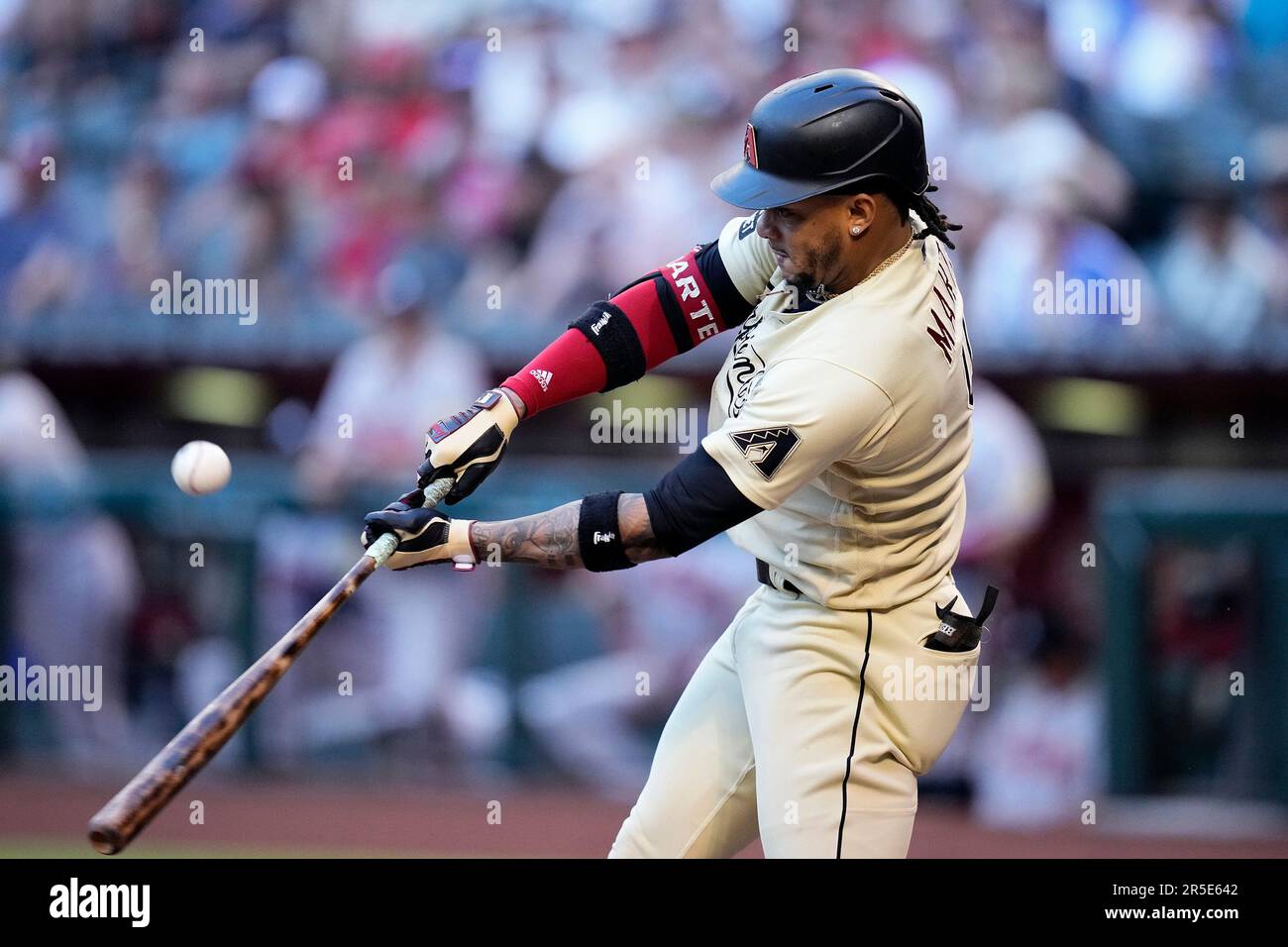 Arizona Diamondbacks' Ketel Marte fouls off a pitch against the Atlanta Braves during the first ...