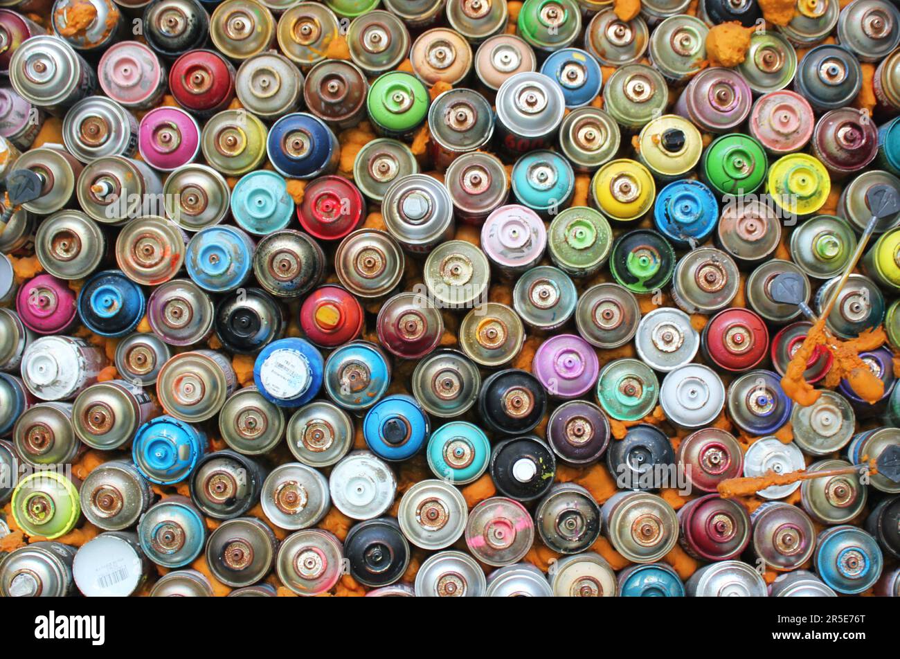 Spray Cans Stacked On A Wall Stock Photo - Alamy