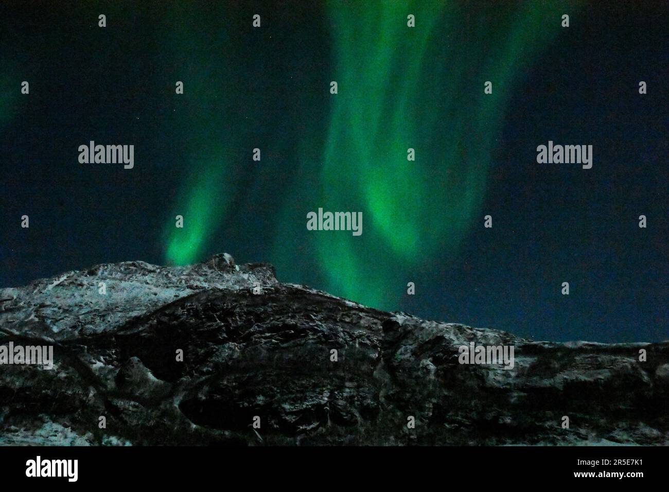 Bright Green Colours of the Northern Light, Aurora Borealis illuminate ...