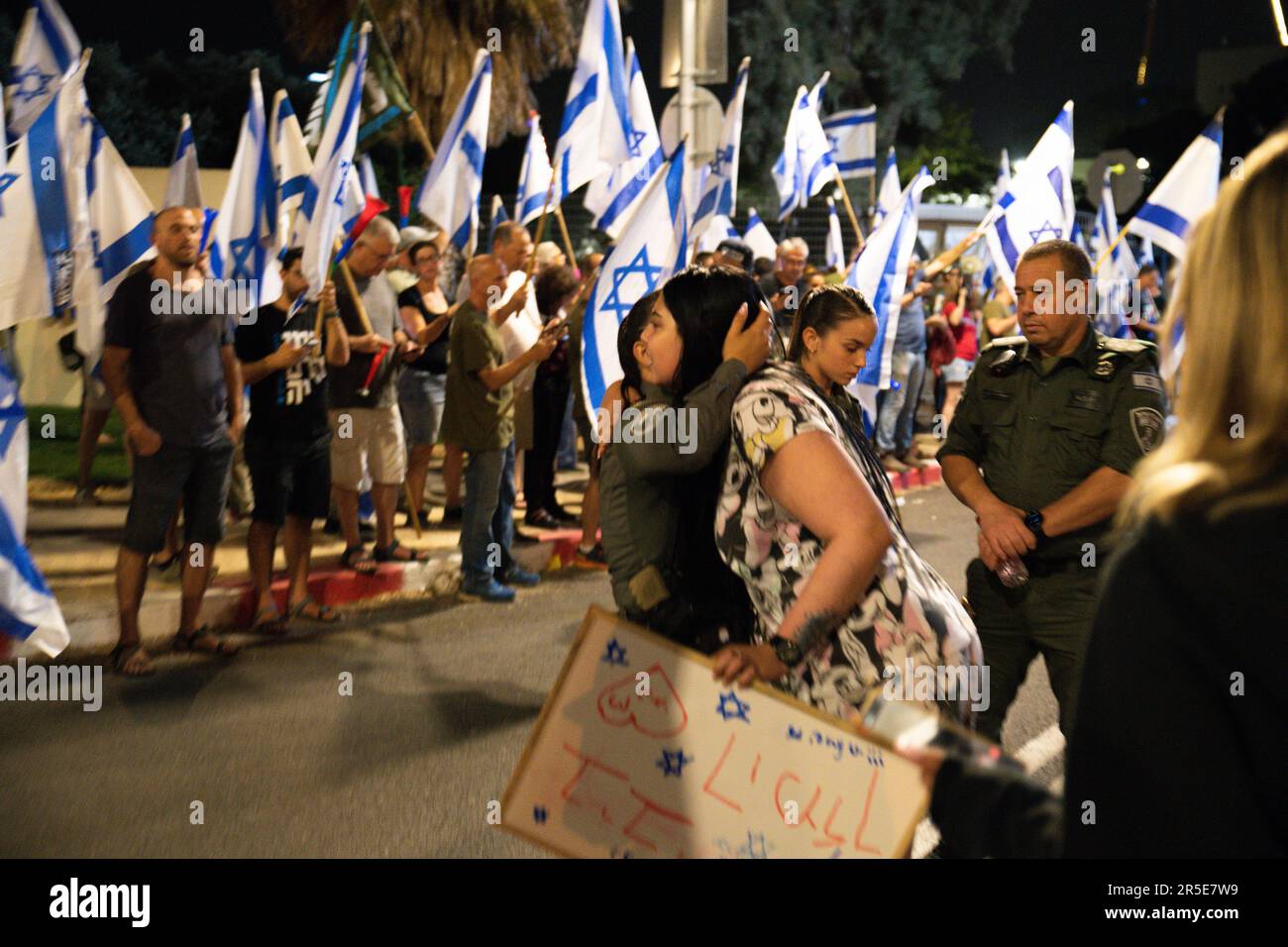 Israel. 02nd June, 2023. An Israeli border police officer hugs a ...