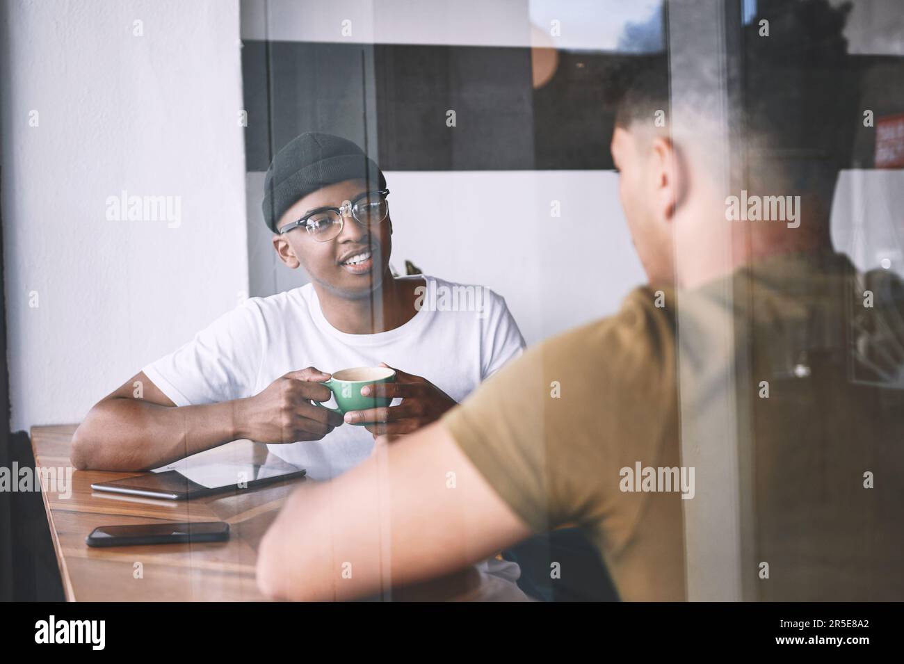 Two men enjoy cozy hi-res stock photography and images - Alamy