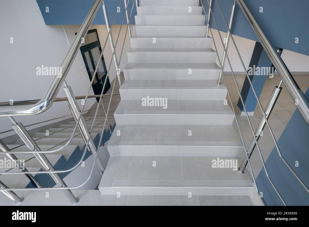 stairs emergency and evacuation exit stair in up ladder in a new office ...