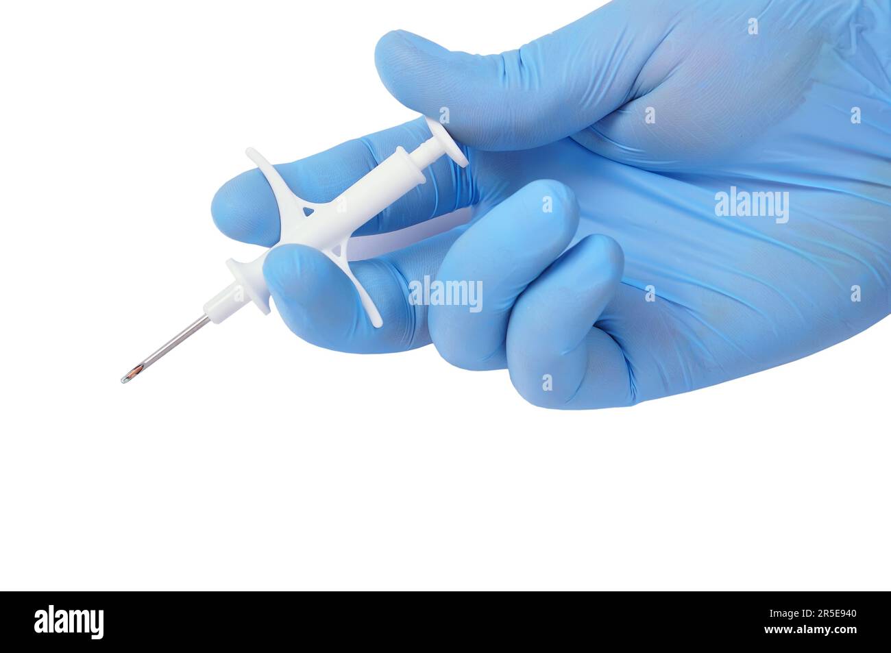 hand holding syringe for introduction of chip Stock Photo - Alamy