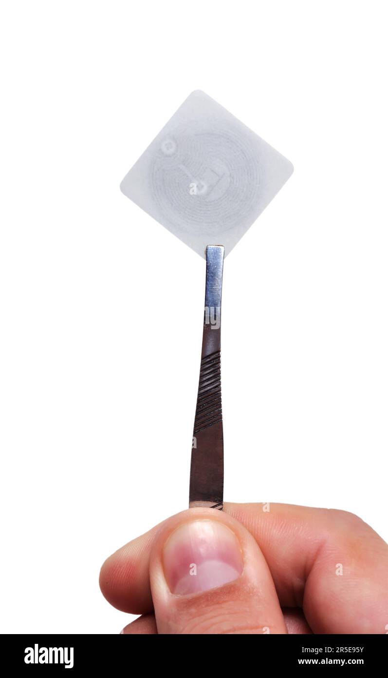 hand holding rfid tags on tweezers Stock Photo - Alamy