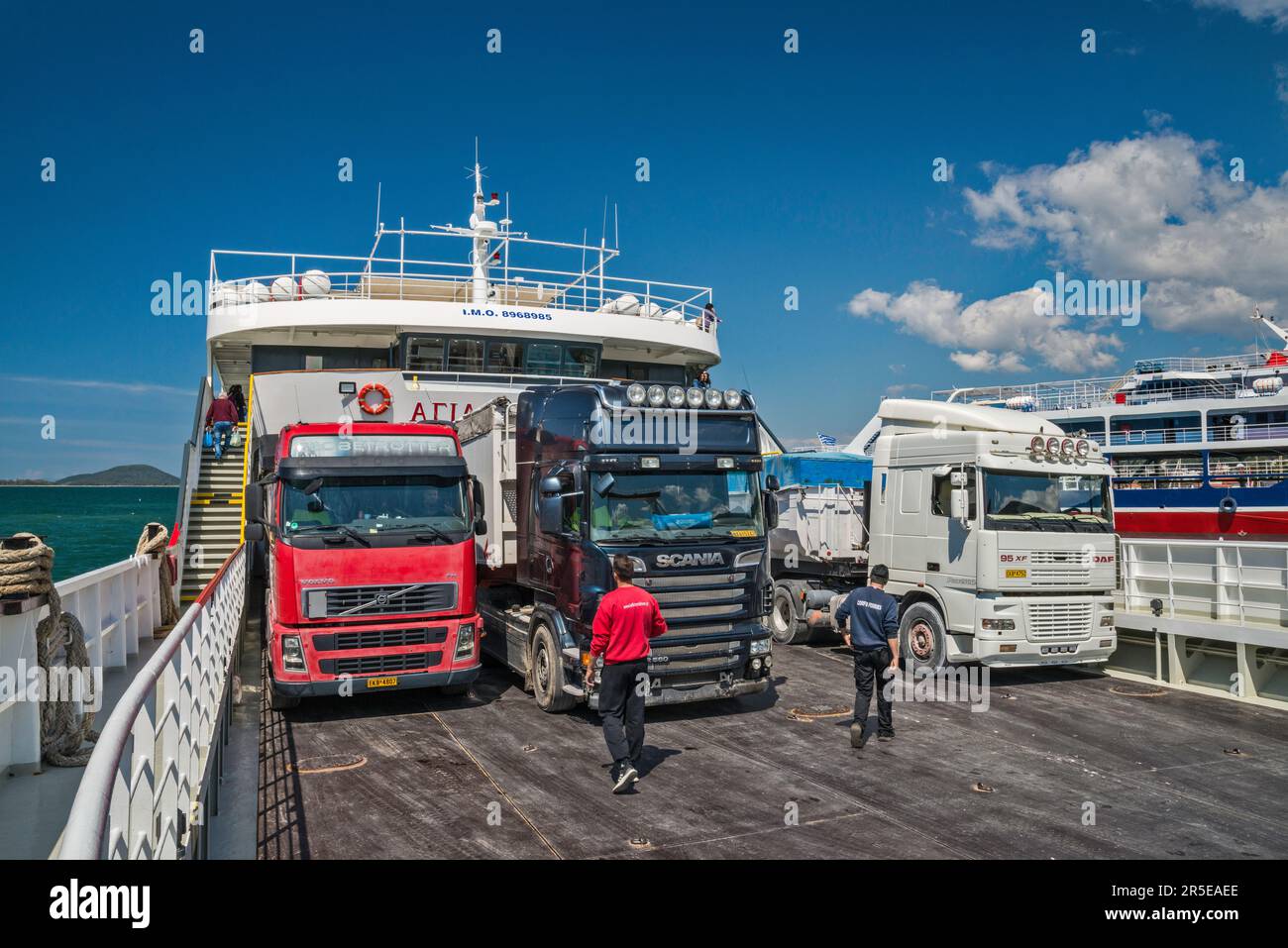 Vehicles boarding with very little space left, Agia Triada ferry ...