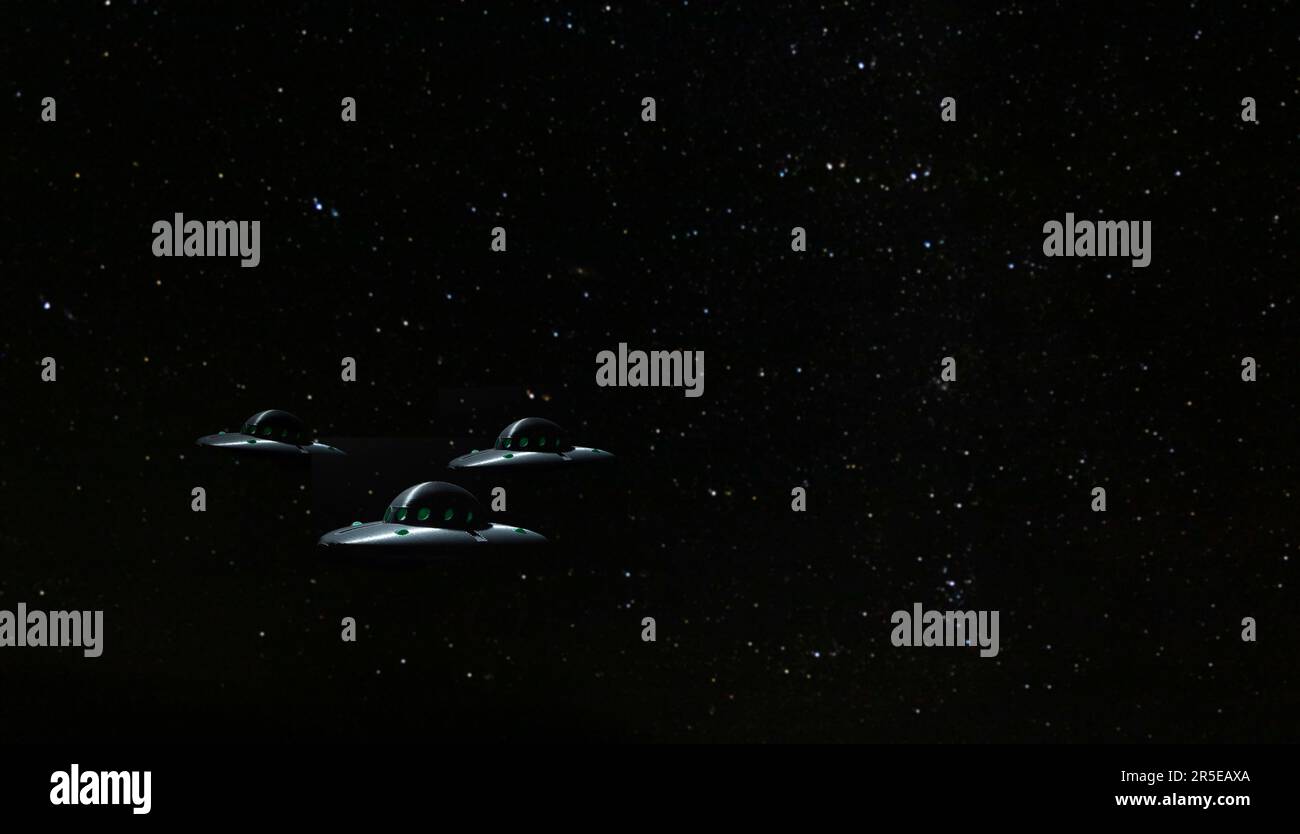 Three flying saucers in attack formation with stars behind Stock Photo ...