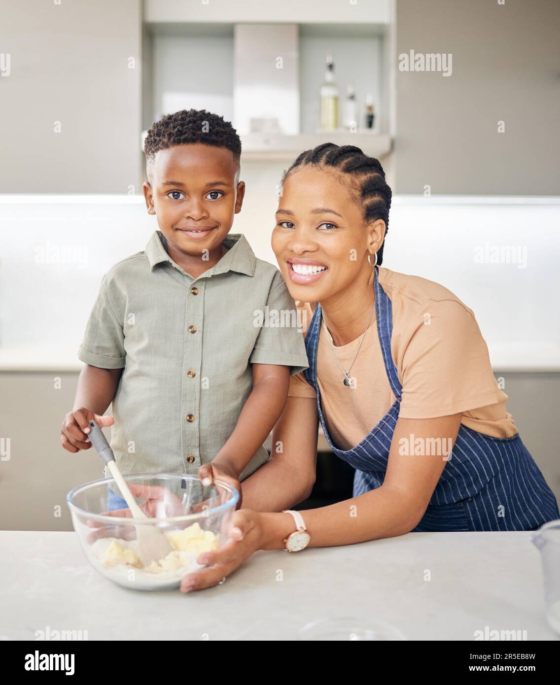 Mother, son and happy baking portrait at kitchen counter with help and ...