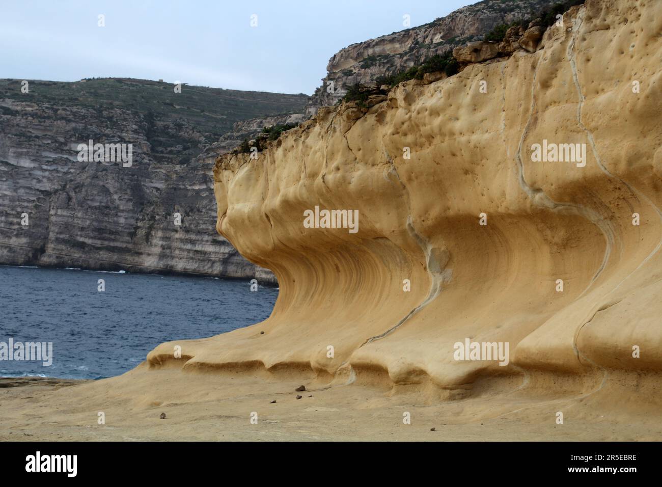 Heavily wind eroded limestone cliffs of Xlendi Bay, Gozo, Malta Stock ...