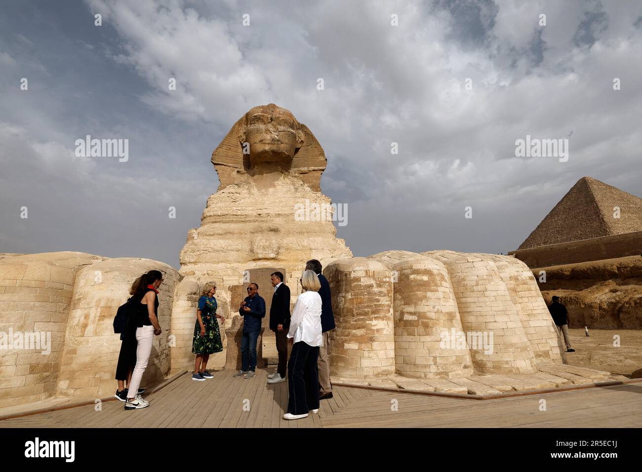 First Lady Jill Biden, center left, listens to Mostafa Waziri ...