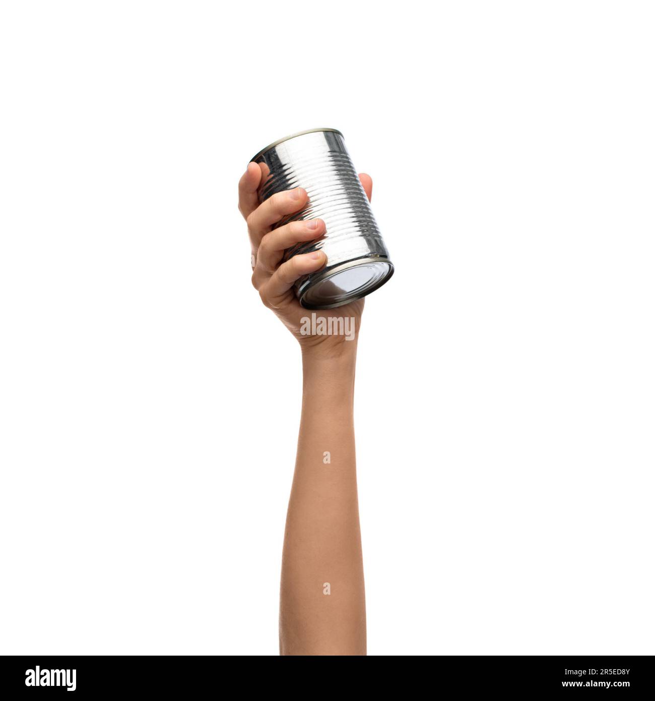 hand holding tin can with preserved food Stock Photo - Alamy