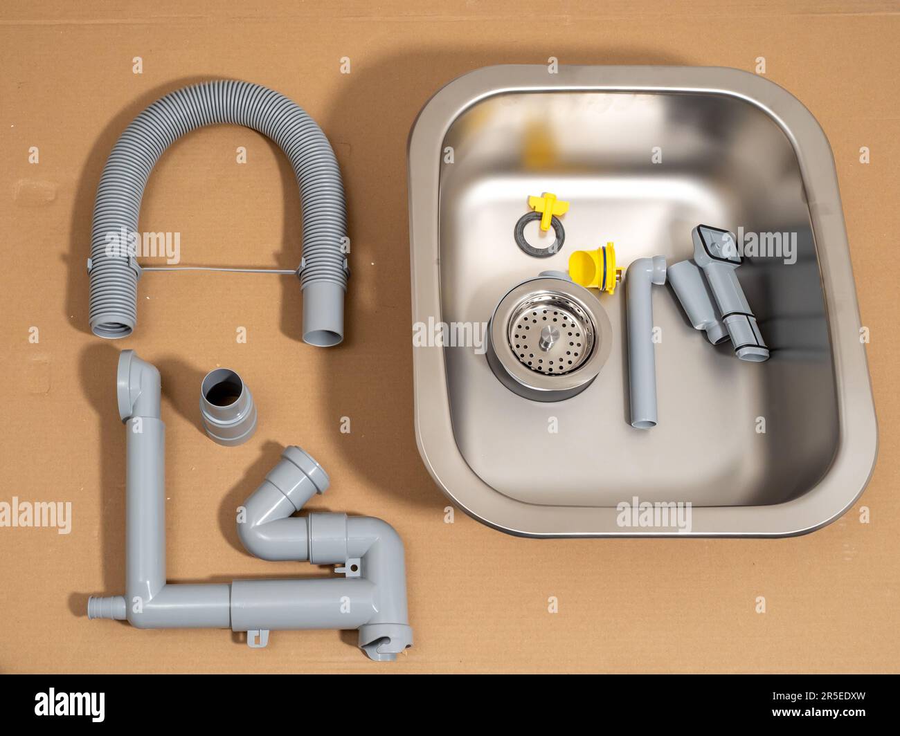 The kitchen sink fittings are ready-to-install next to the sink on ...