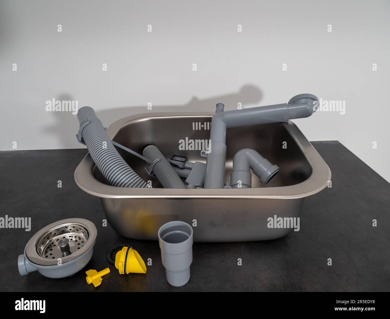 The kitchen sink fittings are ready to be installed next to the sink on ...