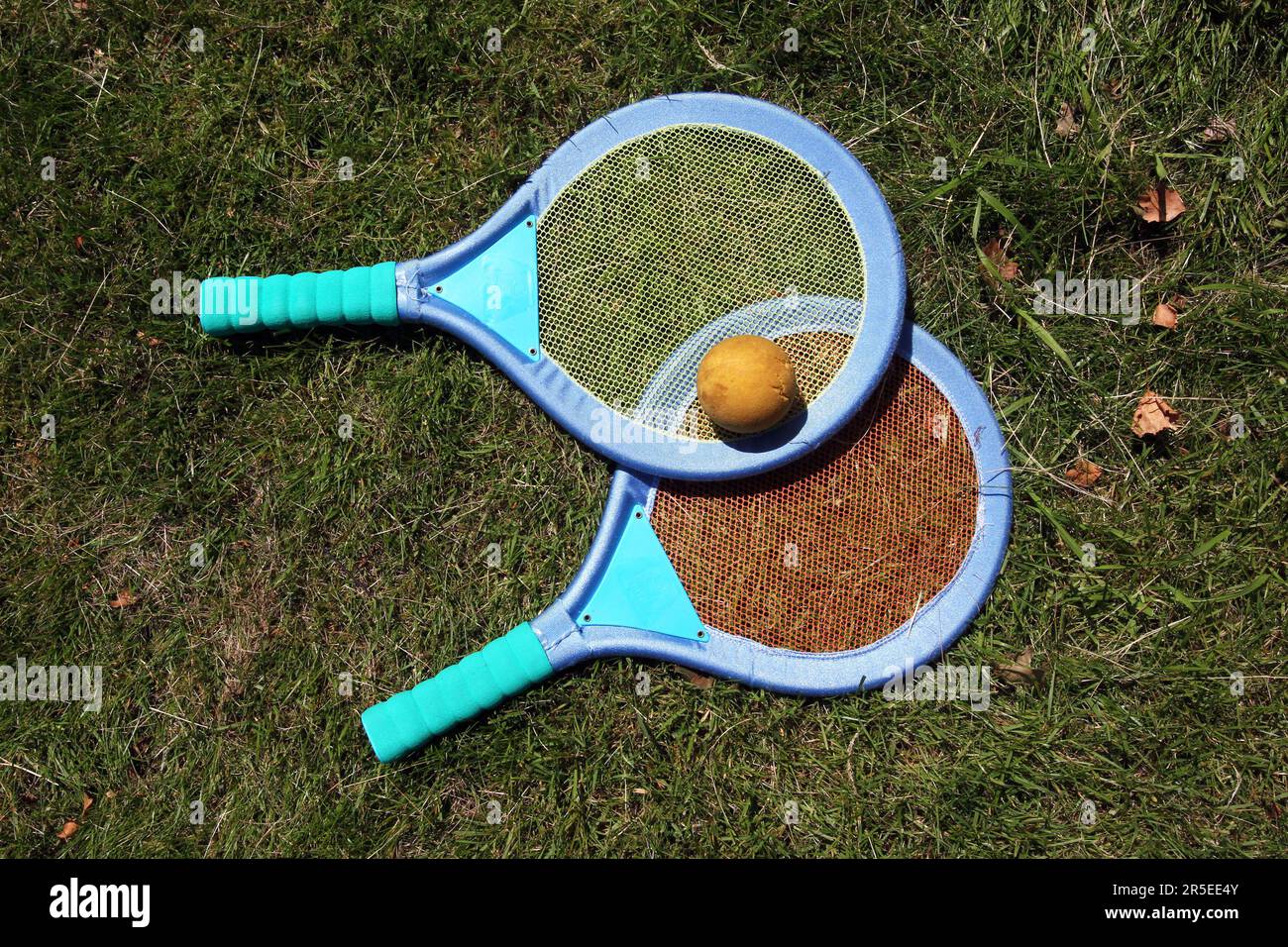 Summer sports, rackets and a ball Stock Photo - Alamy