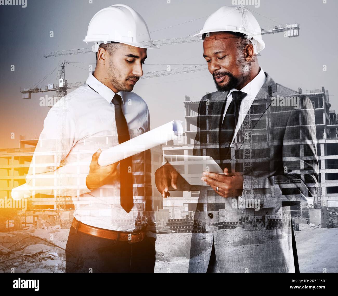Entrusted with the citys construction. two handsome businessmen superimposed over a construction ...