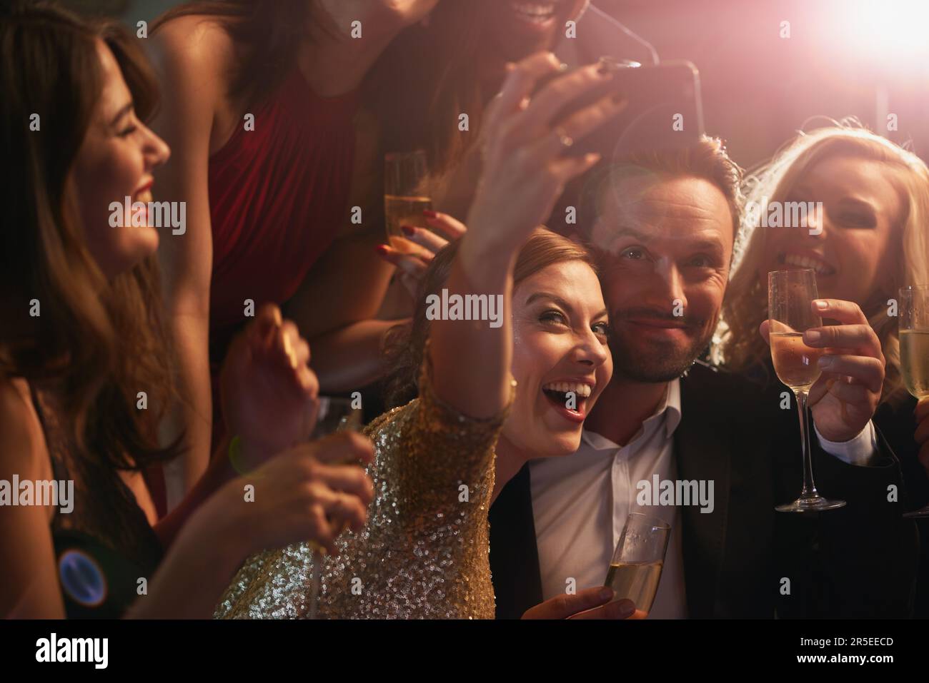 Selfie, party and new year with friends in a nightclub posing for ...