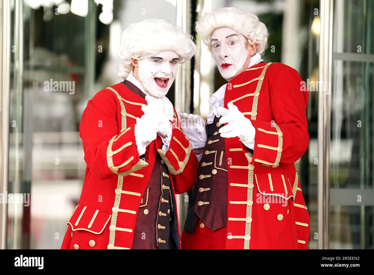 Racegoers in fancy dress and face paint during Derby Day of the 2023 ...