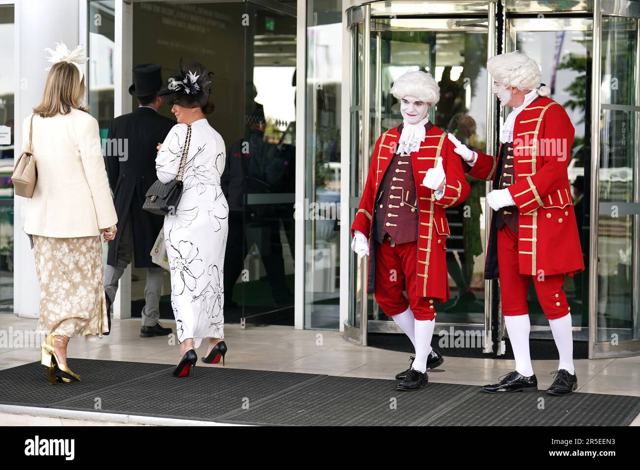 Racegoers in fancy dress and face paint during Derby Day of the 2023 ...