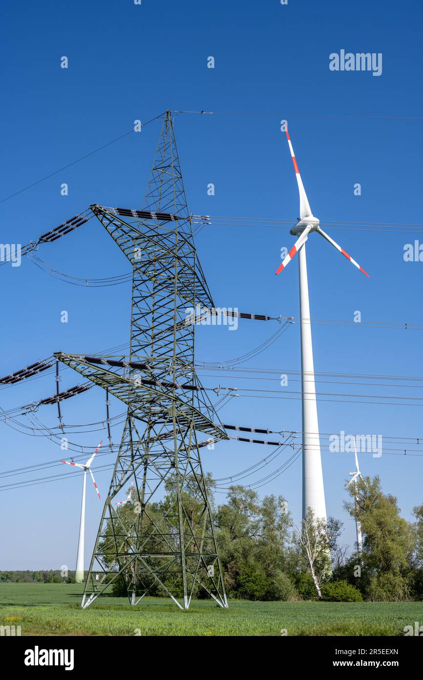 Wind turbine and an electricity pylon seen in Germany Stock Photo - Alamy