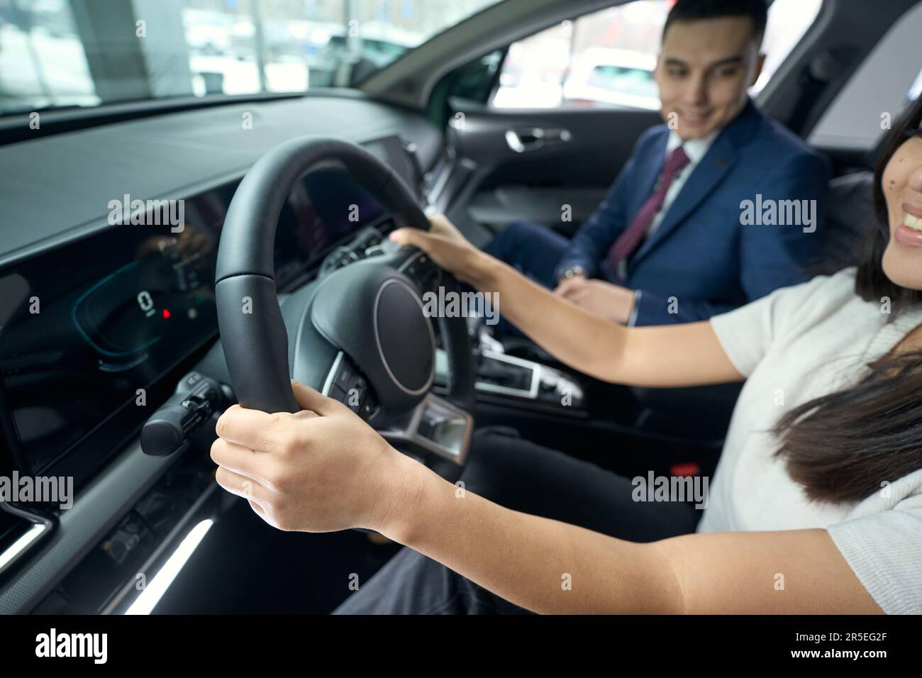 Man woman behind the wheel hi-res stock photography and images - Alamy