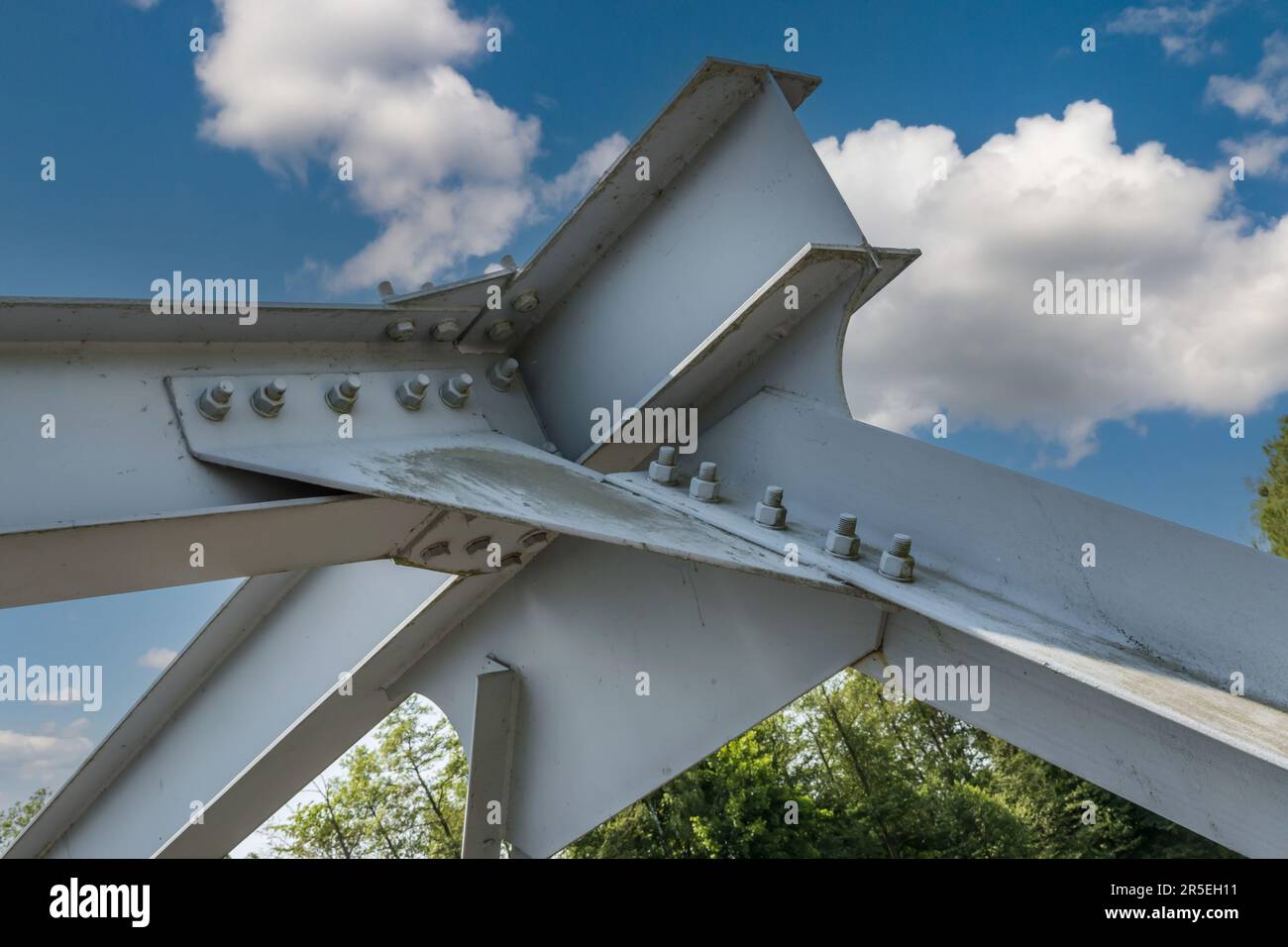 Bolts and nuts on metal plates of steel structure of heavy duty ...