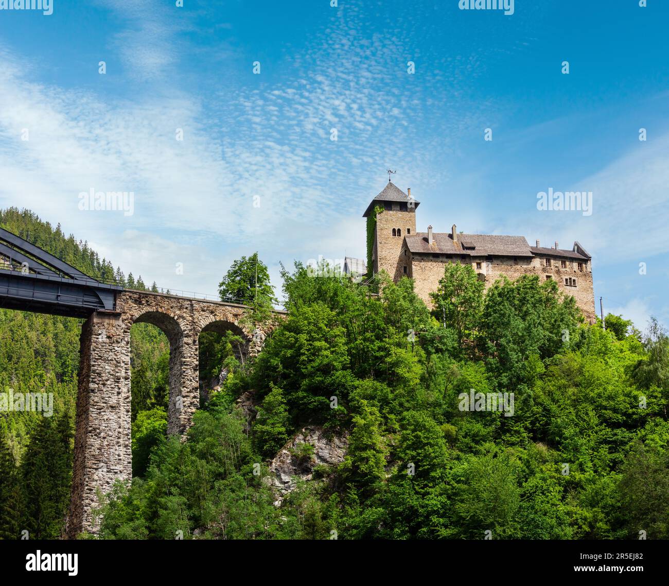 Summer alpine Trisanna railroad bridge over Trisanna river and ...