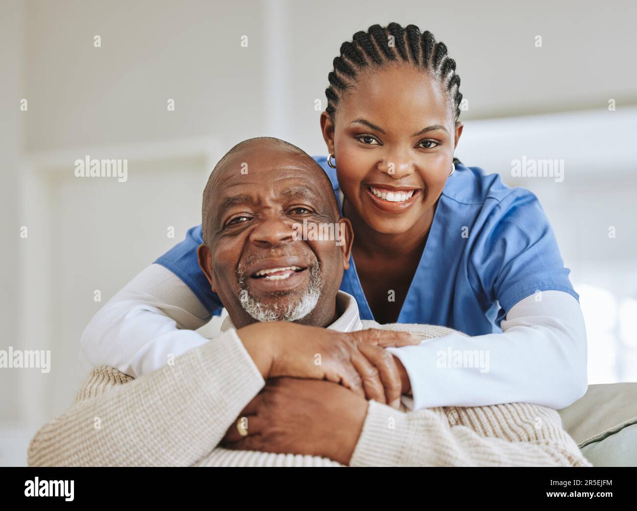 Senior Man Nurse And Hug Portrait On A Sofa For Support Healthcare