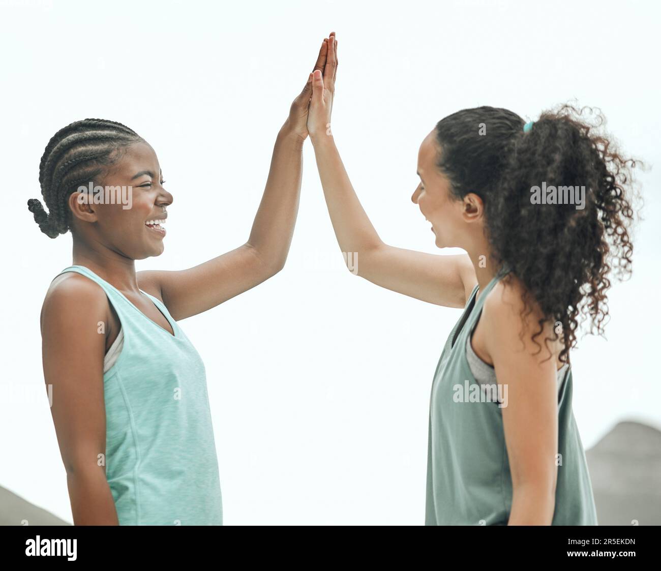 Fitness friends outdoor, high five and women smile with support, team ...