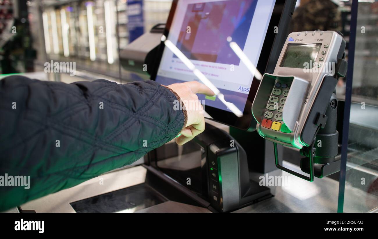 Credit Card Transaction at a Self-Checkout Supermarket Station by a ...