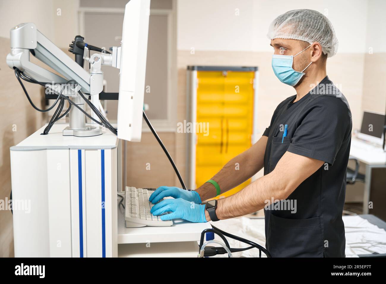 Healthcare professional using modern equipment during diagnostic ...