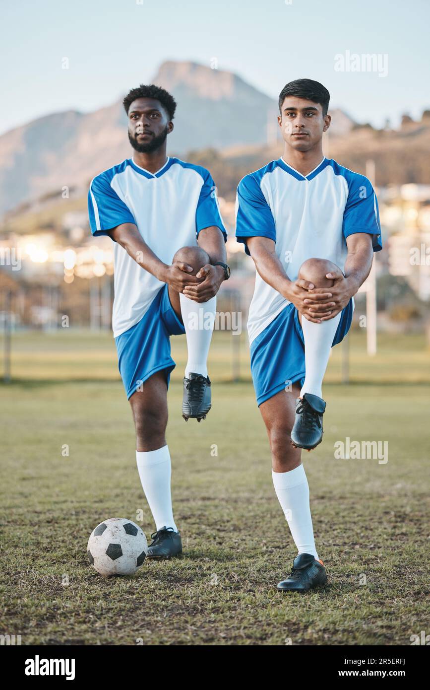 Football, team sports and stretching legs on field for fitness ...