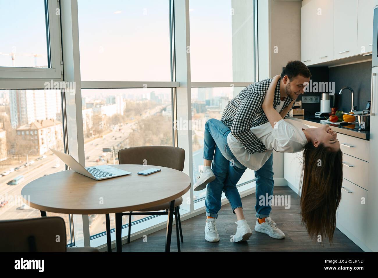 Happy spouses dancing embracing hi-res stock photography and images - Alamy