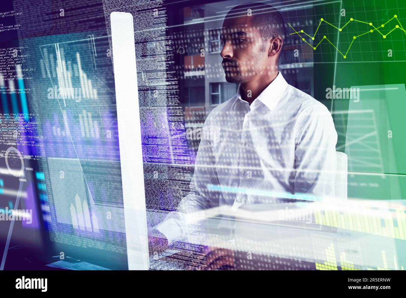 Programmers put in the hours. a young computer programmer looking through data Stock Photo - Alamy