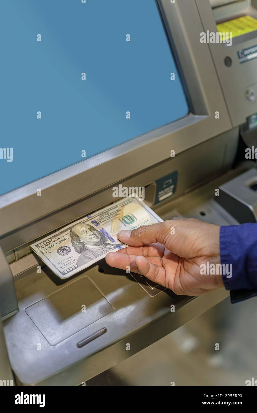 Taking money bills atm hi-res stock photography and images - Alamy