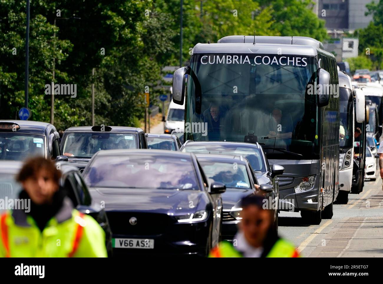 Coaches carrying fans make their way towards Wembley Stadium ahead of ...