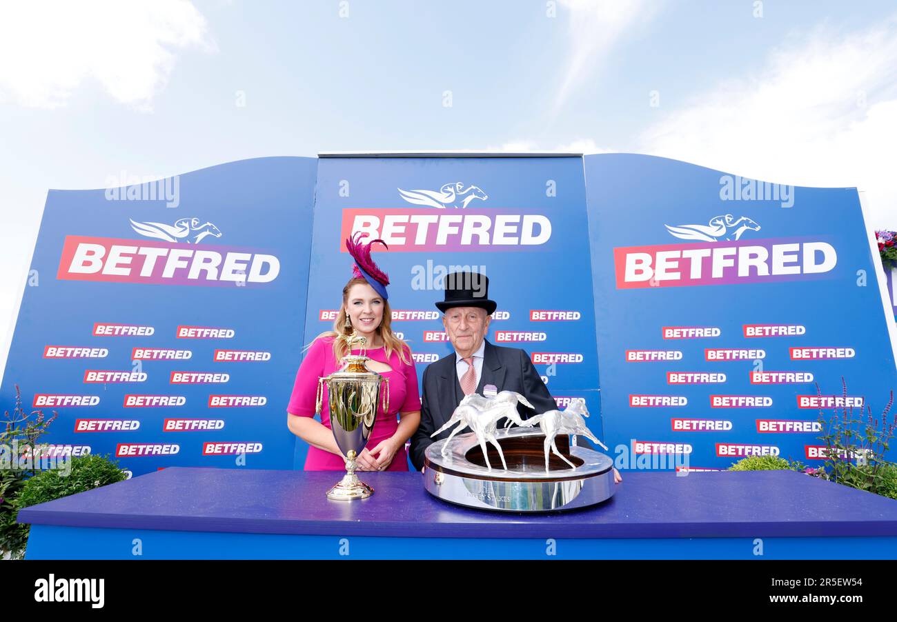 Katrina Helmer and Betfred owner Fred Done pose with the Kentucky Derby ...